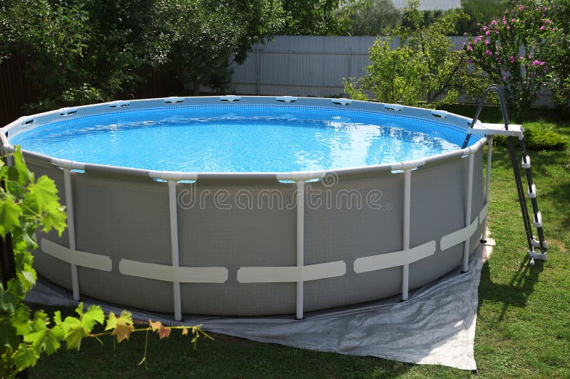 Above Ground Swimming Pool Outdoors on Sunny Day Stock Image - Image of ...