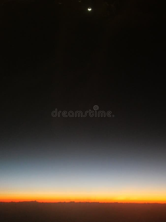 First Light of the Day with the Moon in the Dark Stock Image - Image of ...