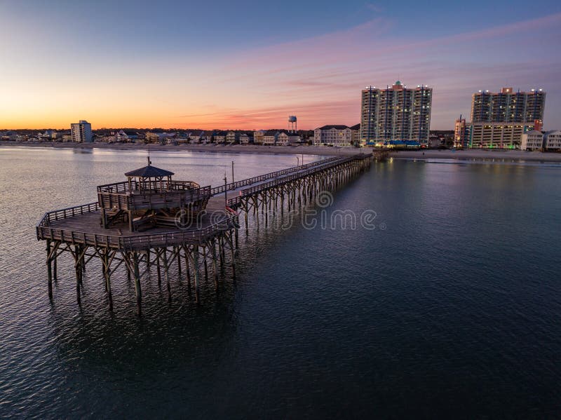 Above a Pier in N Myrtle Beach Stock Image - Image of horizon, skyline ...