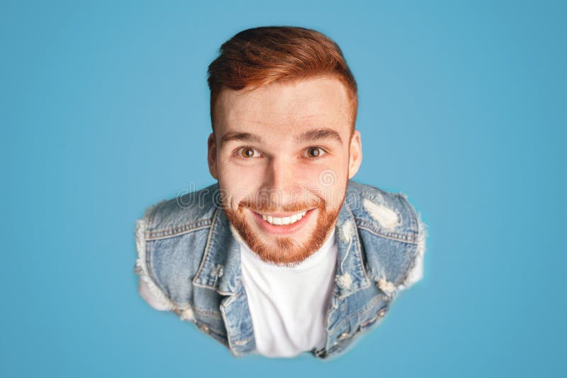 Above Portrait of Funny Millennial Redhaired Guy, Smiling Upwards at Camera Stock Image - Image ...
