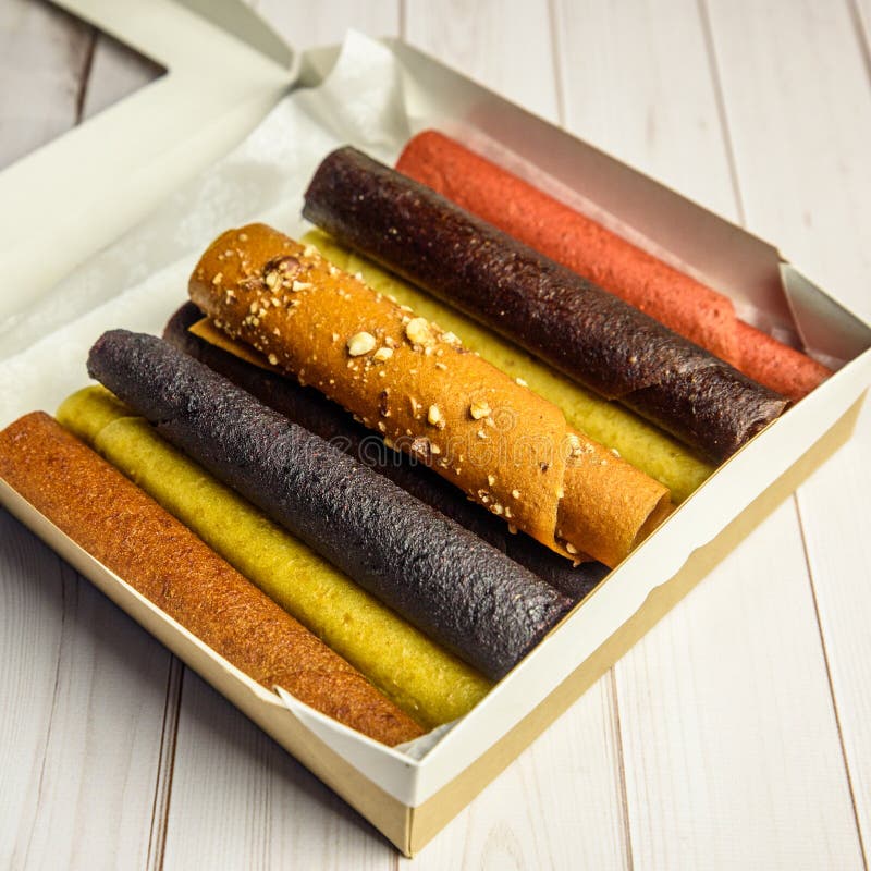 Rolls of tasty fruit paste stock image. Image of paste - 106681915