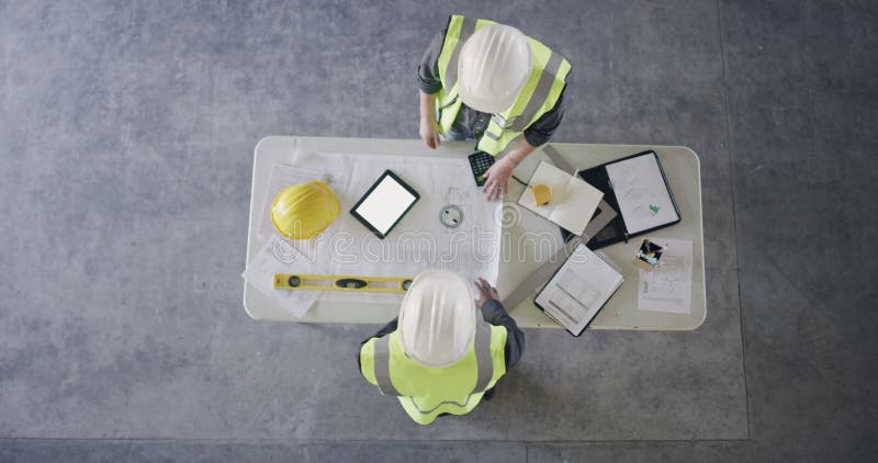 Above, Tablet or Engineers for Handshake on Table, Safety Gear or ...
