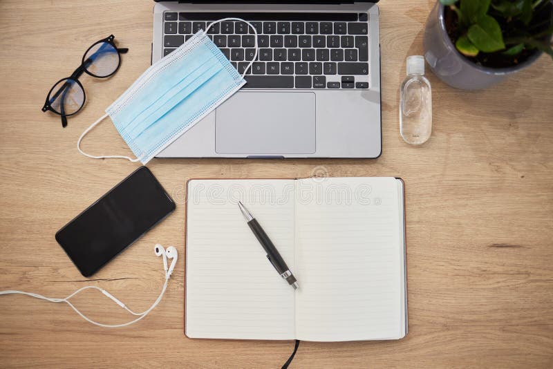 Above, Tech and Notebook on Table for Remote Work, Distance Learning ...