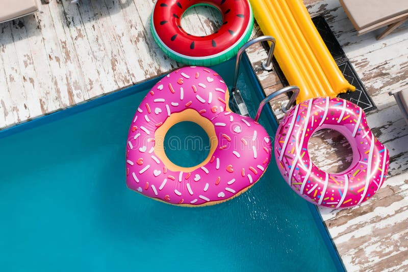 Above View of Inflatable Rings and Swimming Pool. Summer Stock Photo ...