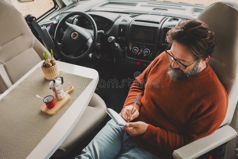 Above View of Man Having Relax Leisure Activity and Taking Notes on ...