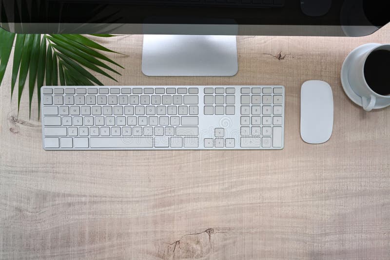 Modern Workspace with Computer and Coffee Cup on Wooden Desk. Stock ...