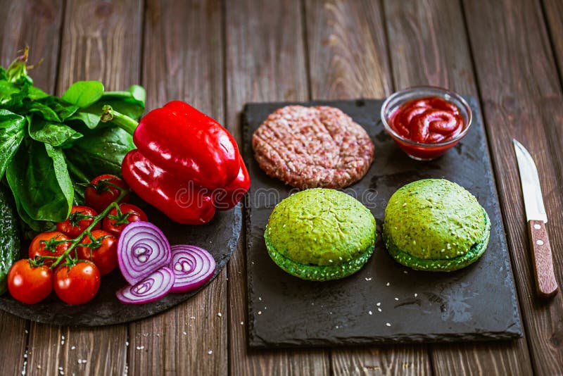 From Above View of Process of Making Burger with Vegetables, Green Buns ...