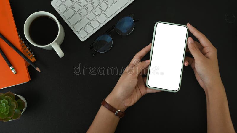 Above View Woman Hands Using Mobile Phone on Black Leather. Stock Image ...