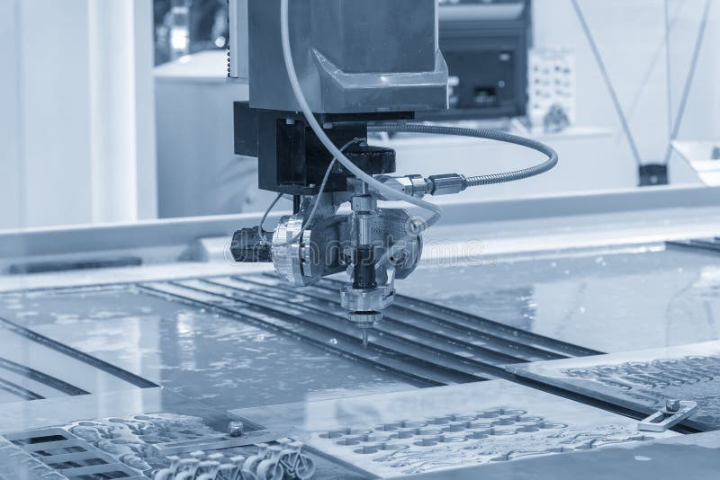 The Abrasive Water Jet Machine in the Light Blue Scene. Stock Photo ...