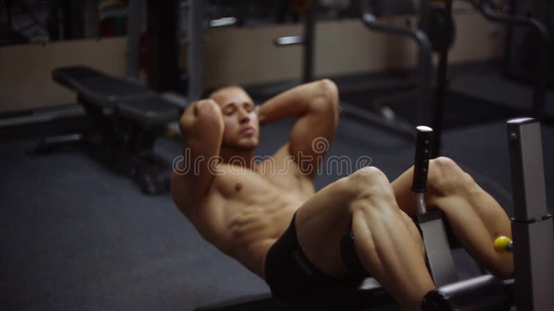 Abs crunches on bench stock footage. Video of topless - 59783060