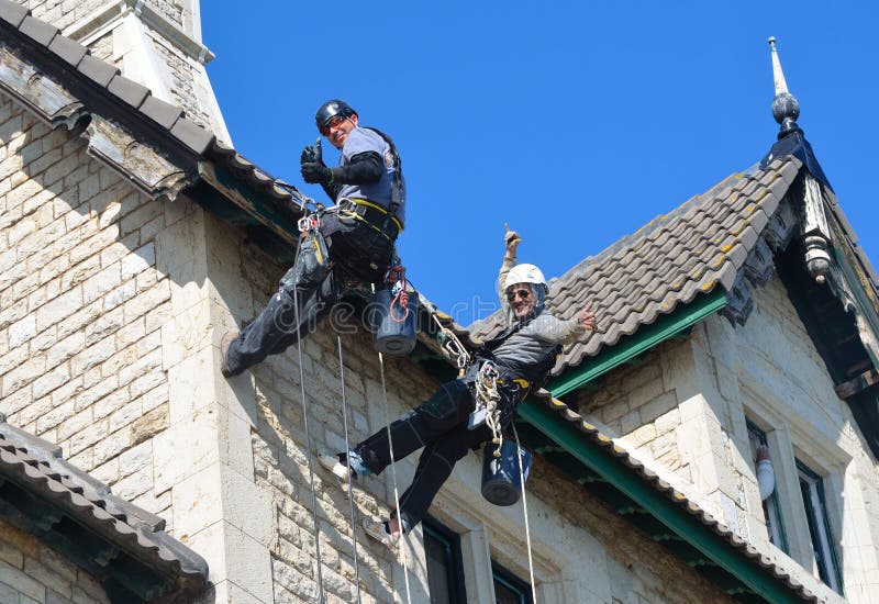 Abseiling Building Maintenance Workers at Work. Editorial Image - Image ...