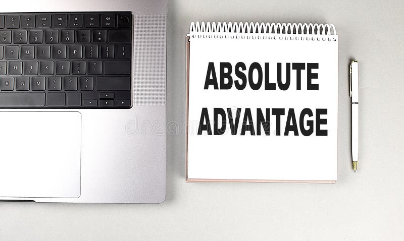 ABSOLUTE ADVANTAGE Text on Notebook with Laptop and Pen Stock Image ...