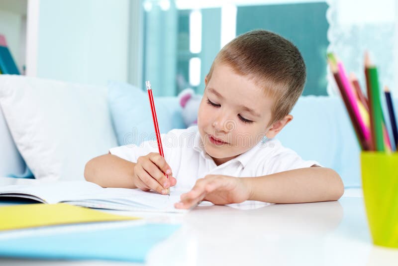 Absorbed in drawing stock image. Image of expression - 28377155