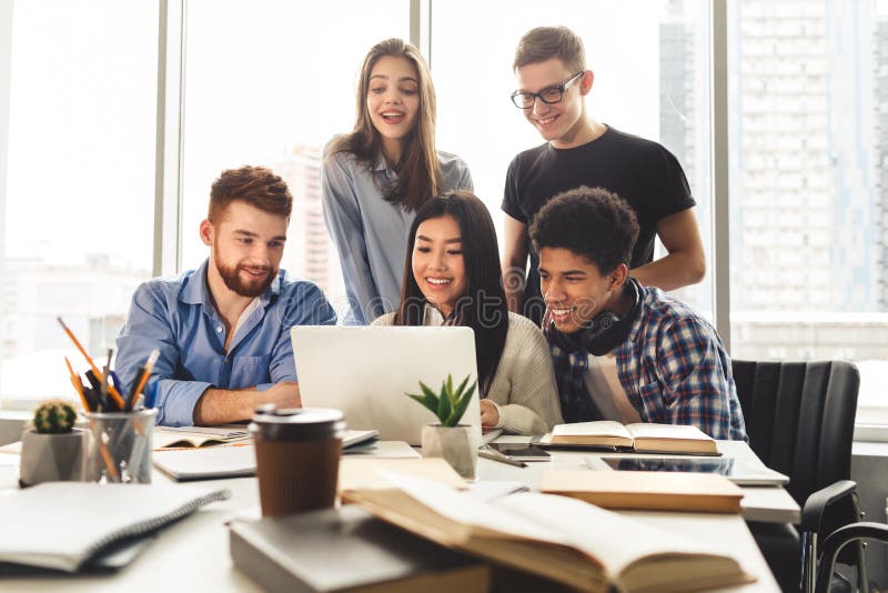 Absorbed Students Looking at Laptop and Study at Library Stock Image ...