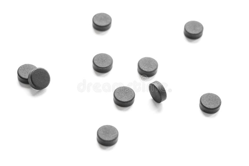 Absorbent Carbon in Pills on a White Background Stock Photo - Image of ...