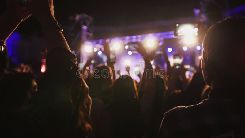 The Crowd of Shadows of People Dancing at the Concert Stock Image ...