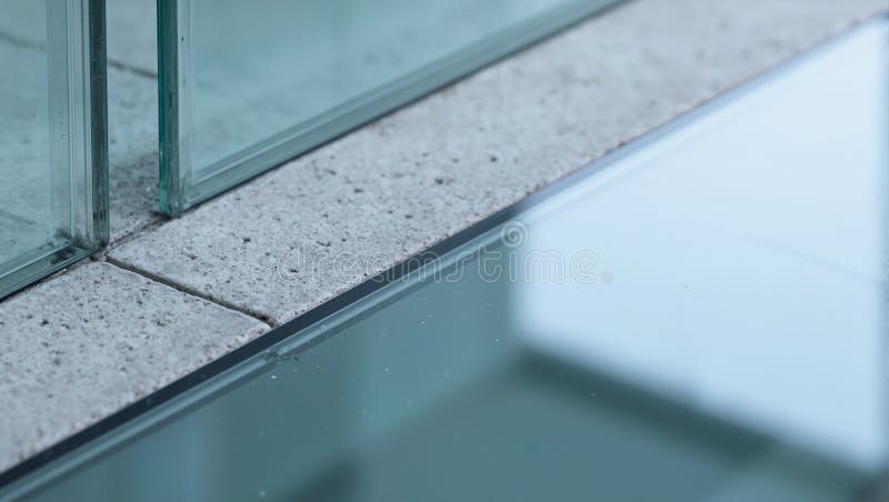 Abstract Architectural Detail Glass and Concrete Intersection on a ...