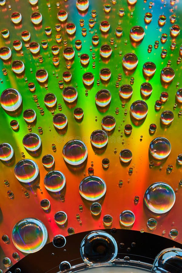 Abstract Background Asset Metallic Surface of Rainbow Colors with Water ...