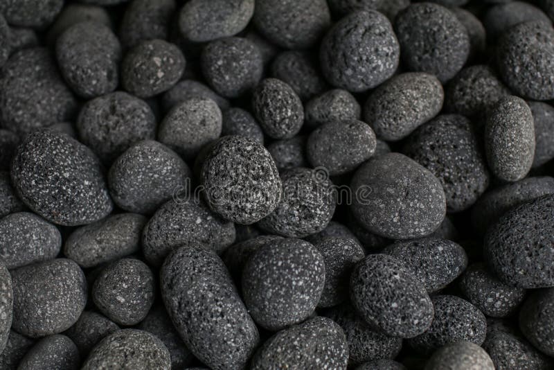Black Pebble Stones or Rocks with White Wall for Texture and Background ...