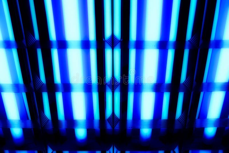 Abstract Background with Blue Fluorescent Lights. Neon Glow from the ...
