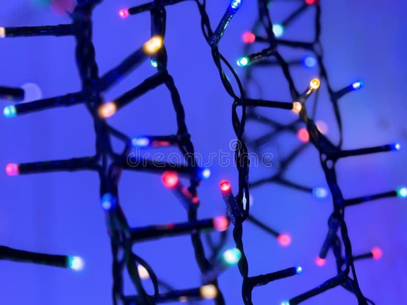 Abstract Background with Blurred Strings of Lights in Assorted Colours ...