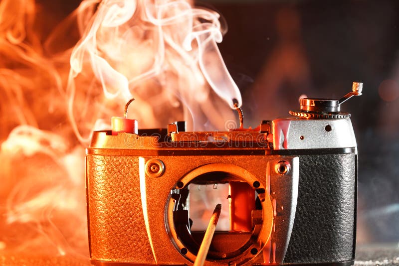 Abstract Background of a Camera on Background of Flame Stock Photo ...