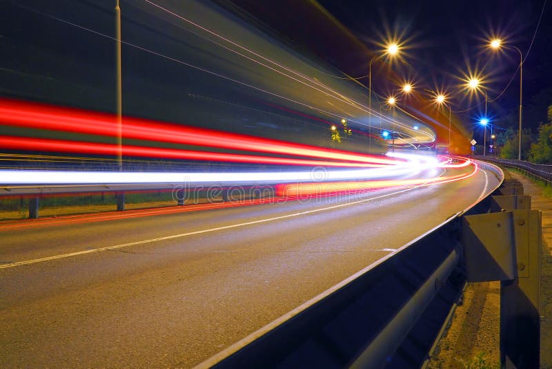 Abstract Background of Car Lights on the Road. Night Car Traffic Stock ...