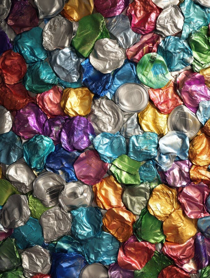 Abstract Background Created from Flattened Cans and Colorful Wrappers ...