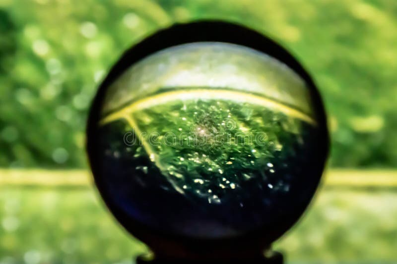 Abstract Background, Glass Ball that Magnifies the Image Behind it ...