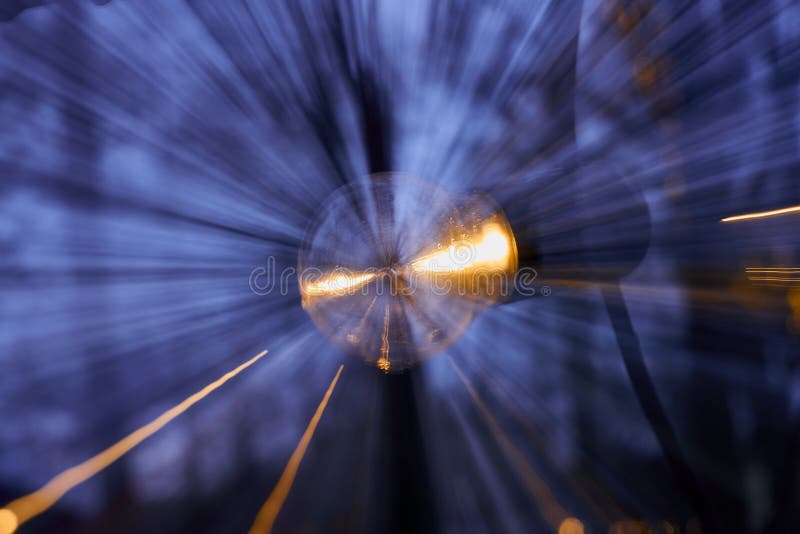 Burning bulb inside a box stock image. Image of science - 164022823