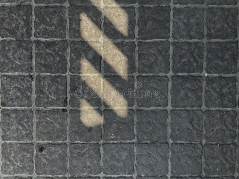 Abstract Background : Light and Shadow on Grey Concrete Blocks Floor ...
