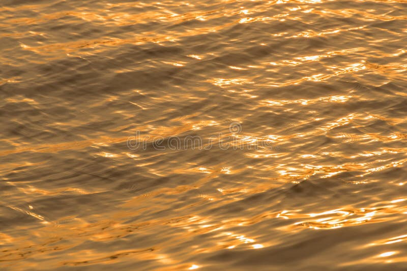 Abstract Background, Texture of Ripples in a River, in the Golden Hour ...