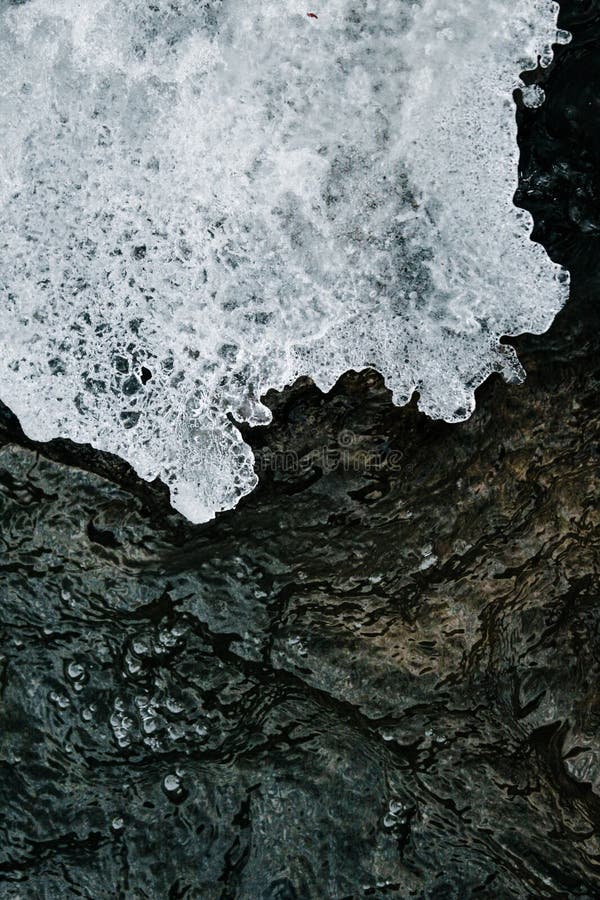 Abstract Beautiful Winter Ice Pattern Formed Over Running Creek Water ...