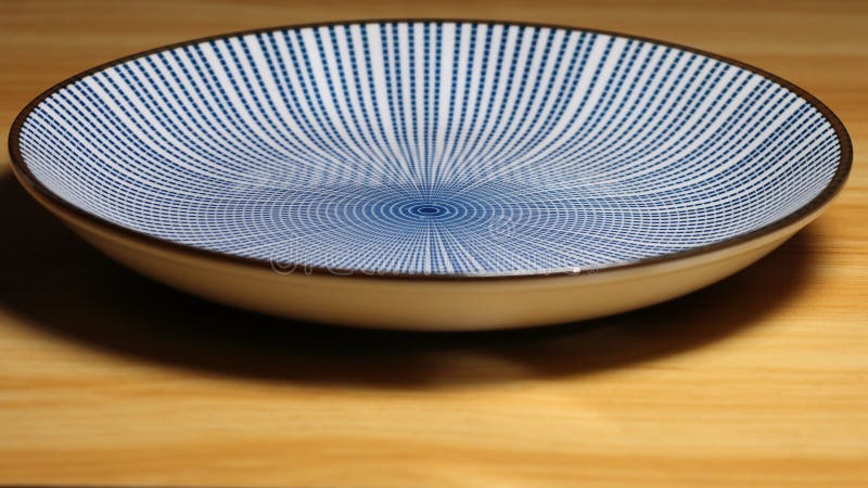 A Posilan Plate with Abstract Blue Background Circles Stock Photo ...