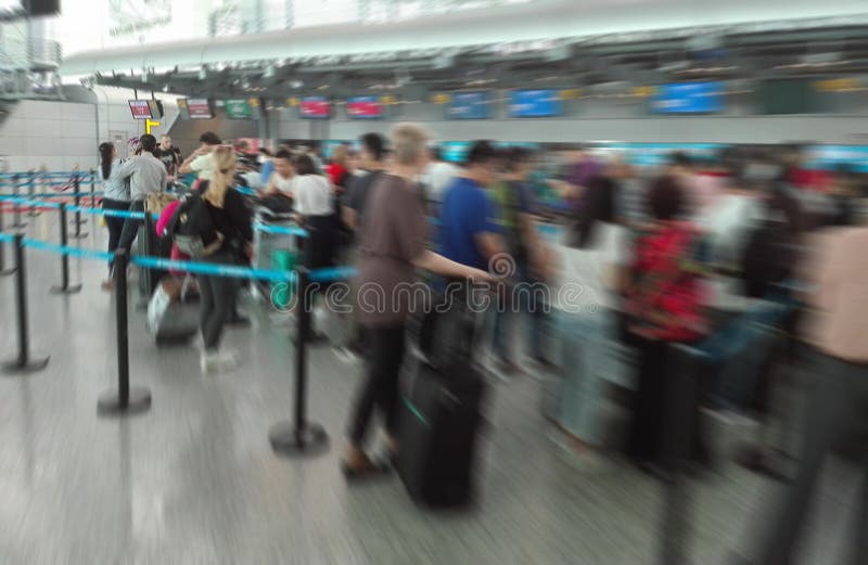 Blurred Image of People in Queue at Airport Check in Desk Stock Photo ...