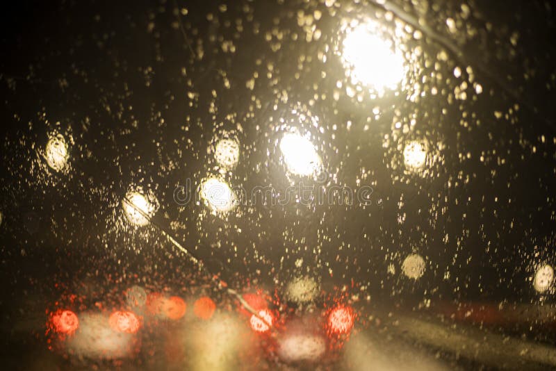 Abstract Blurred Background on the Windshield of a Car with Bright ...