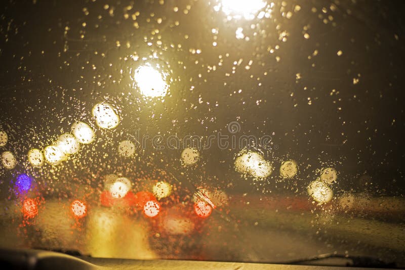 Abstract Blurred Background on the Windshield of a Car with Bright ...