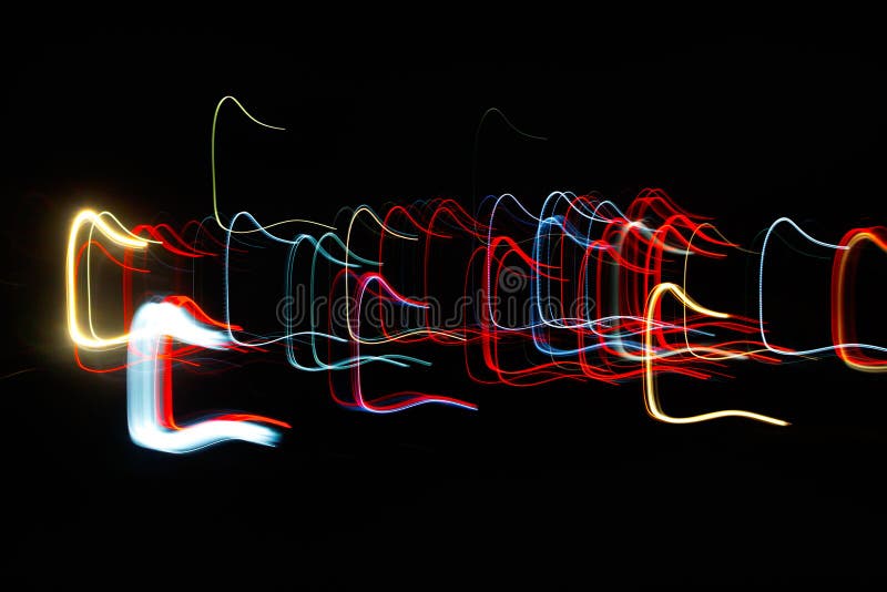 Abstract Blurred Colorful Light Effect on a Black Background. Long ...