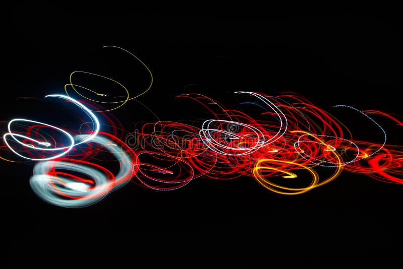 Abstract Blurred Colorful Light Effect on a Black Background. Long ...