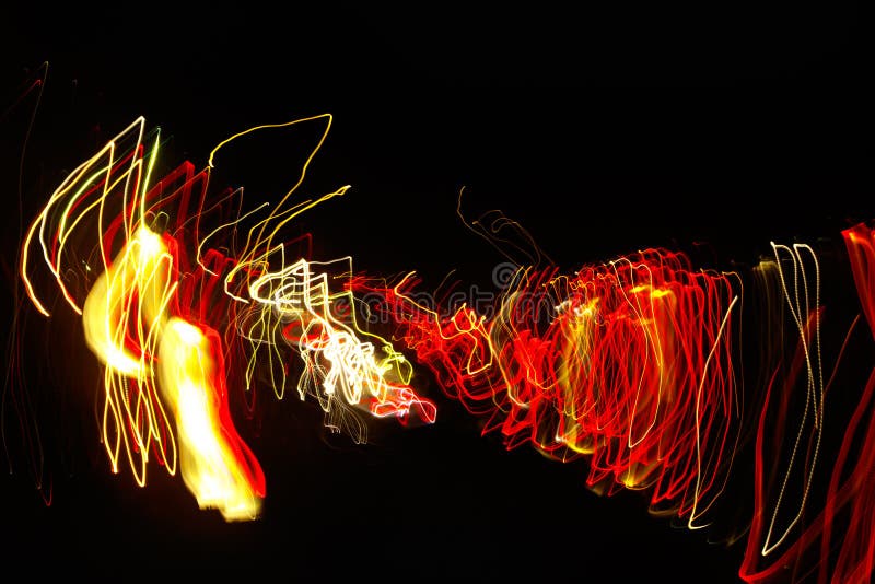 Abstract Blurred Colorful Light Effect on a Black Background. Long ...