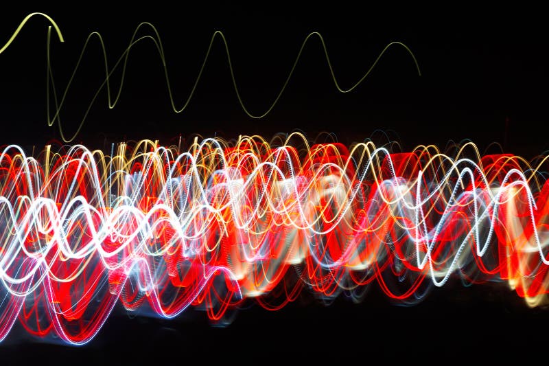 Abstract Blurred Colorful Light Effect on a Black Background. Long ...