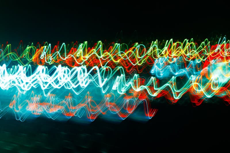 Abstract Blurred Colorful Light Effect on a Black Background. Long ...