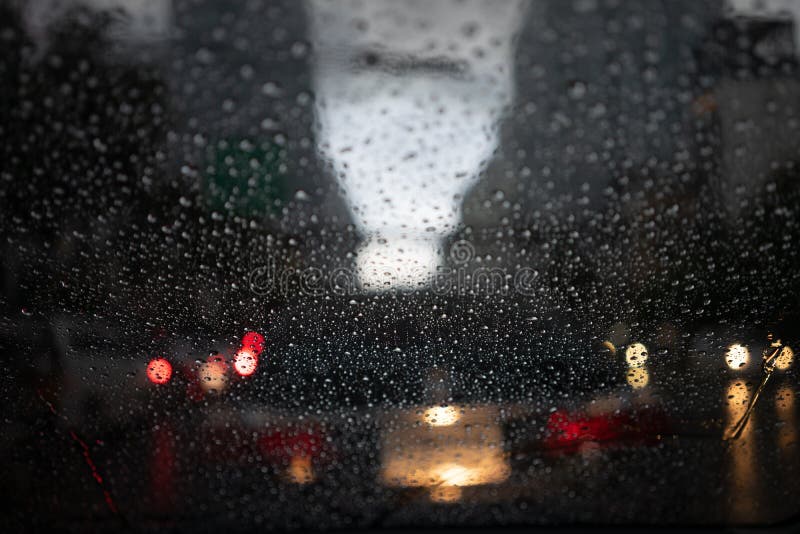 Abstract Blurred Rain while the Car is in the Middle of the Road at ...