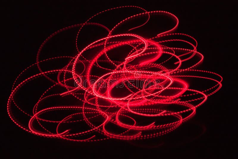 Abstract Blurred Red Light Effect on a Black Background. Long Exposure ...
