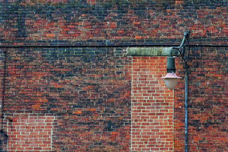Abstract Brick Wall and Lamp Post Stock Photo - Image of space, doors ...