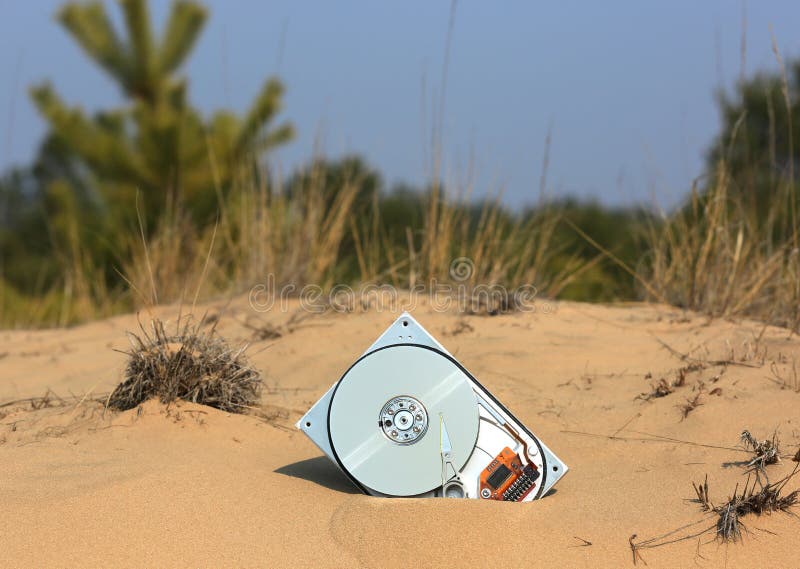 Abstract Broken Computer Hard Drive in Sand Stock Image - Image of ...