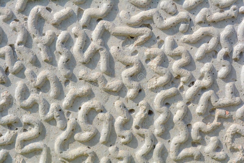 Abstract Carved Stone Texture with Worm or Caterpillar Shape Engraved ...