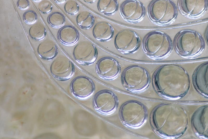 Abstract Circle Pattern in a Glass Brick As Glass Background Shows a ...