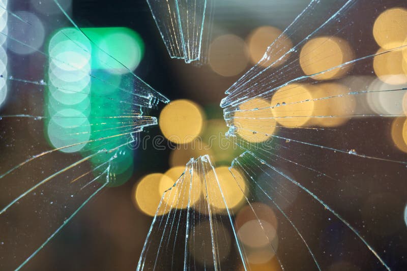 Abstract City Lights Background Behind the Dirty Broken Glass Stock ...