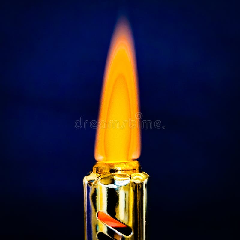 Abstract Close-up of a Hot Burning Lighter Flame Centered on a Dark ...
